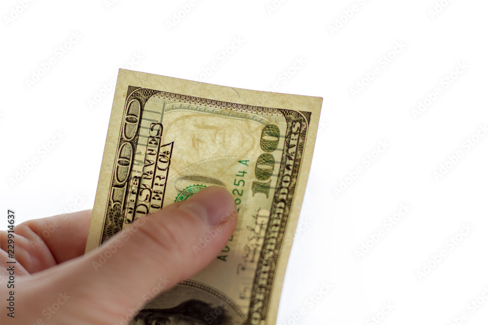 Authentication of banknote 100 dollars for clearance. Watermarks on a ...
