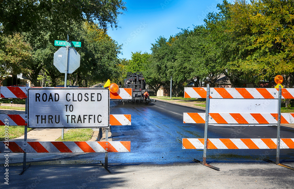Green and quiet neighborhood street closed for maintenance. Road closed ...