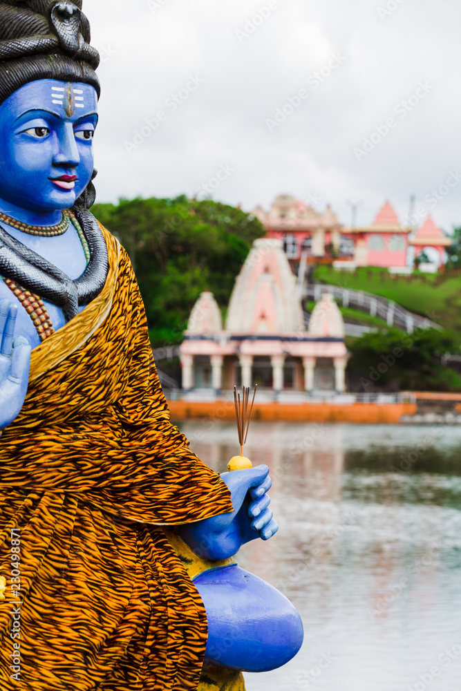 Statue of an indian (hindu, buddhist) divinity: Shiva in a hindu temple ...