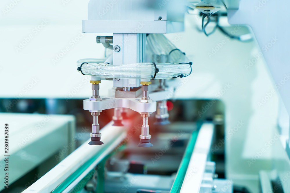 robotic pneumatic piston sucker unit on industrial machine,automation ...