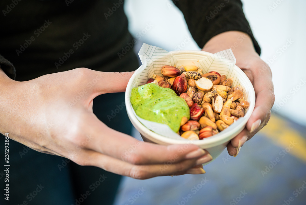 Different kinds of fried Andean corn maize with chilli sauce, a ...