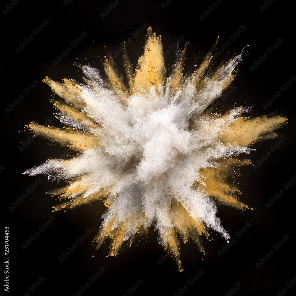 Silver and gold powder explosion on black background. Stock Photo ...
