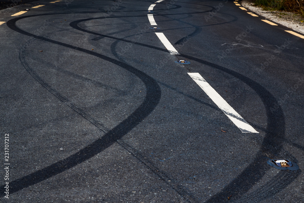 Car tyre skid marks on a rural road Stock Photo | Adobe Stock
