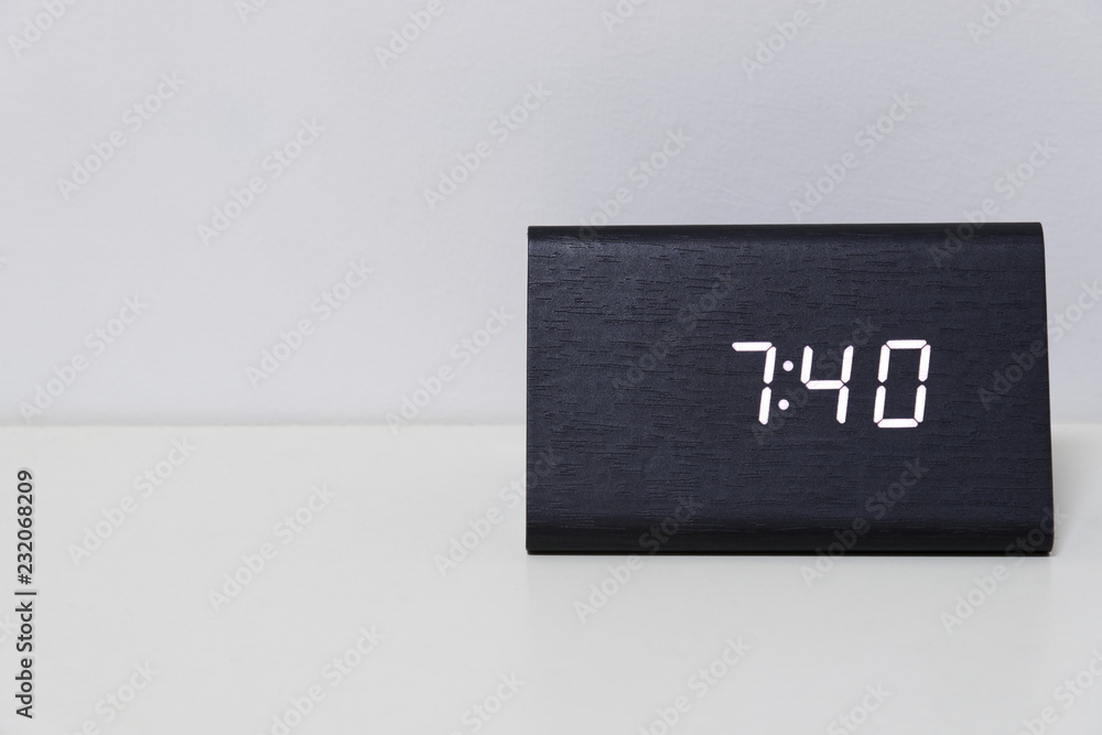 Black digital clock on a white background showing time 7:40 Stock Photo ...