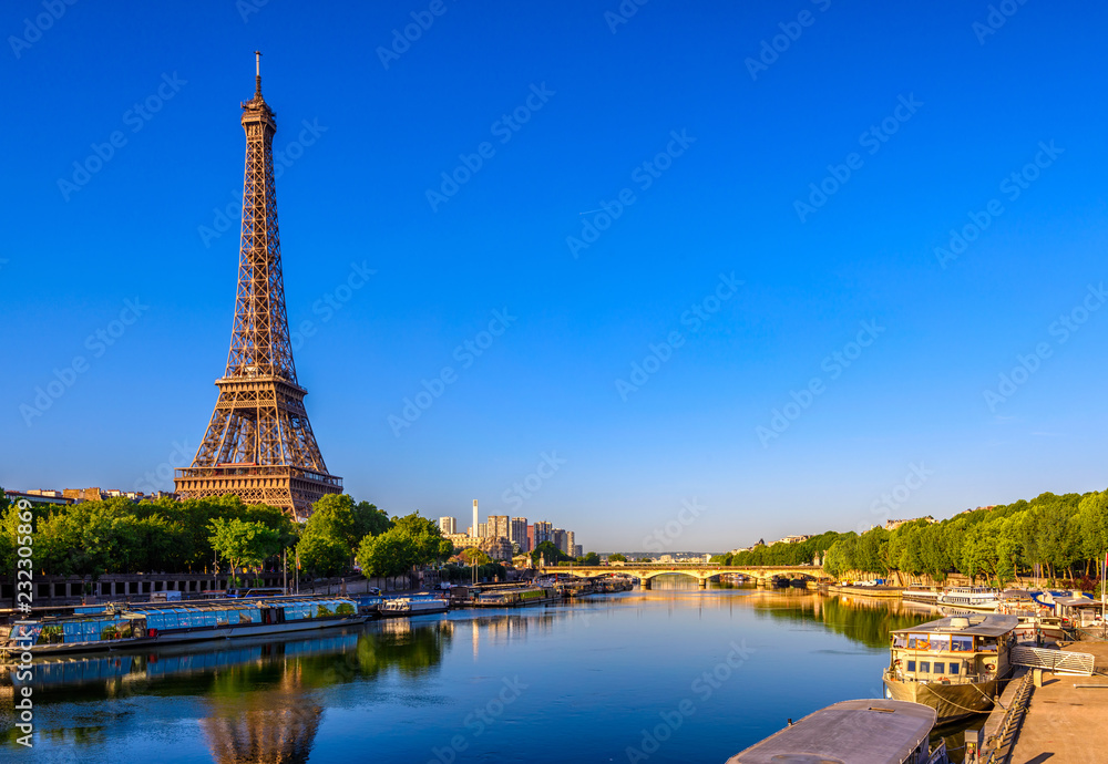 View of Eiffel Tower and river Seine at sunrise in Paris, France ...