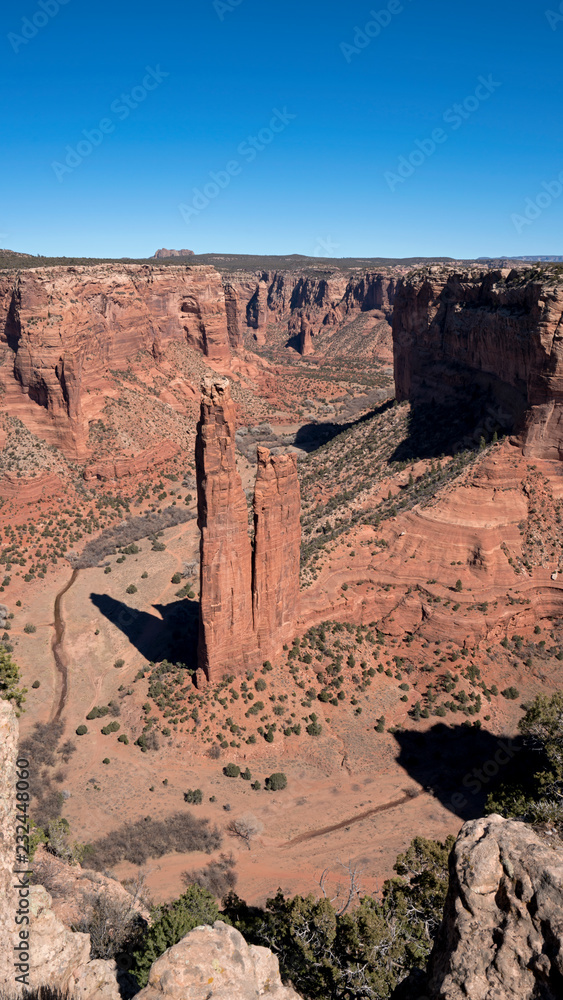 Spider Rock is a sandstone spire rising 750 feet from the canyon floor ...