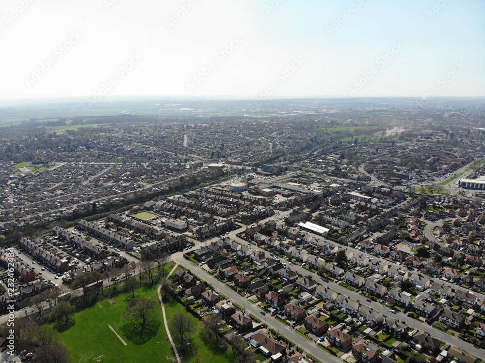 Typical UK Town aerial photo showing rows of houses, roads, parks and ...