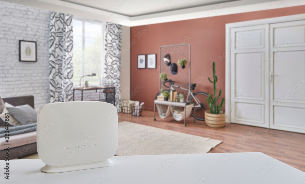 Router and Modem internet box close up and on the white table. Modern ...