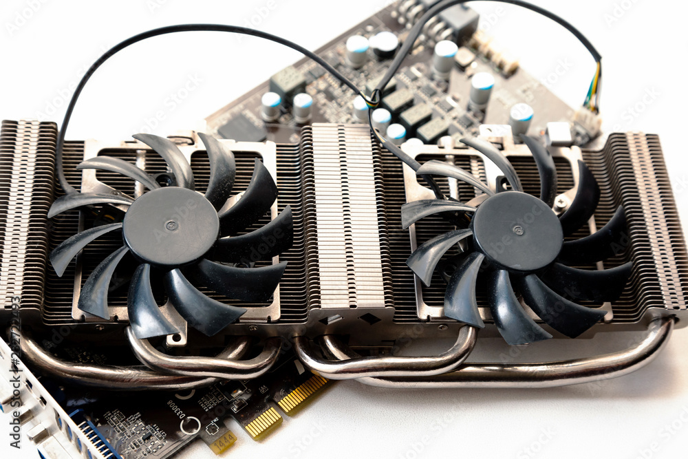 PC graphics card with radiator removed and fans disconnected. Faulty ...