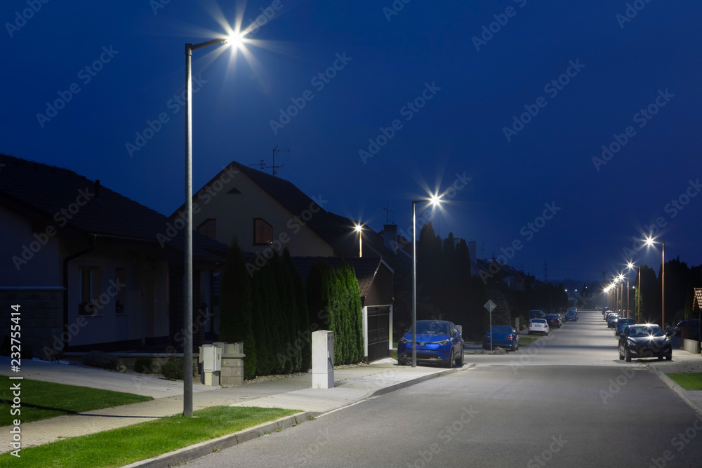 small city street with modern LED streetlights at night Stock Photo ...