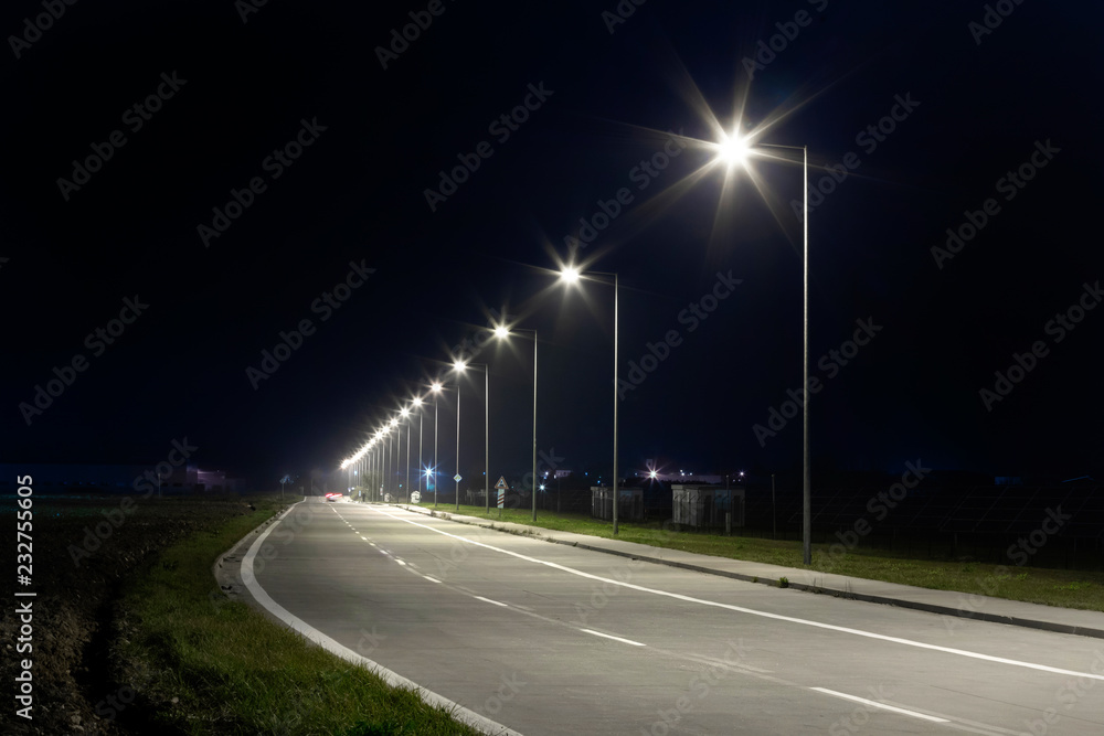 a long row of modern LED street lights Stock Photo | Adobe Stock