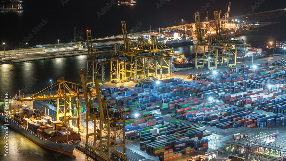 Seaport and loading docks at the port with cranes and multi-colored ...
