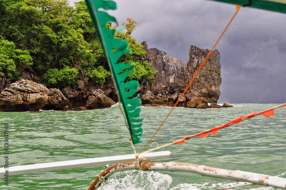 Bamboo outrigger-Filipino bangka boat. Sailing to P.Princesa ...