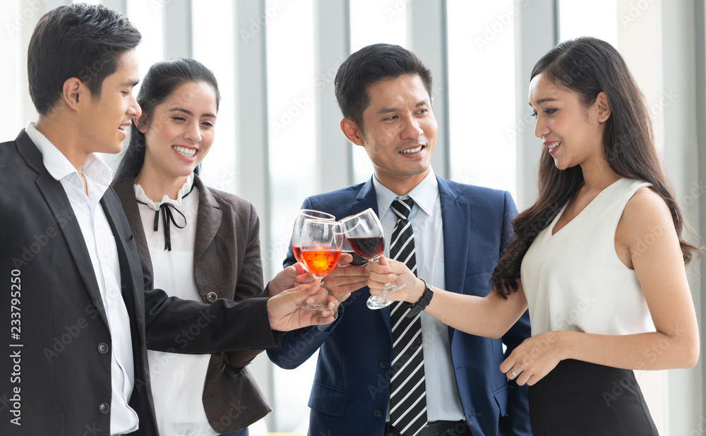 Group of Business People Toasting with red wine. Stock Photo | Adobe Stock