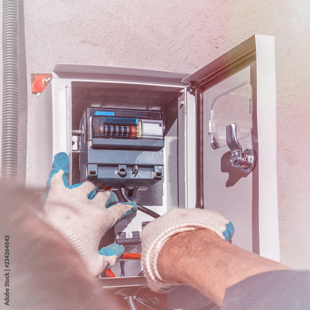 Replacing the old electricity meter with a new one. Repair of ...