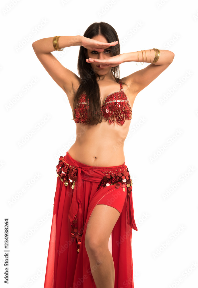 Beautiful belly dancer young woman in gorgeous red and gold costume dress. Part of body Stock ...