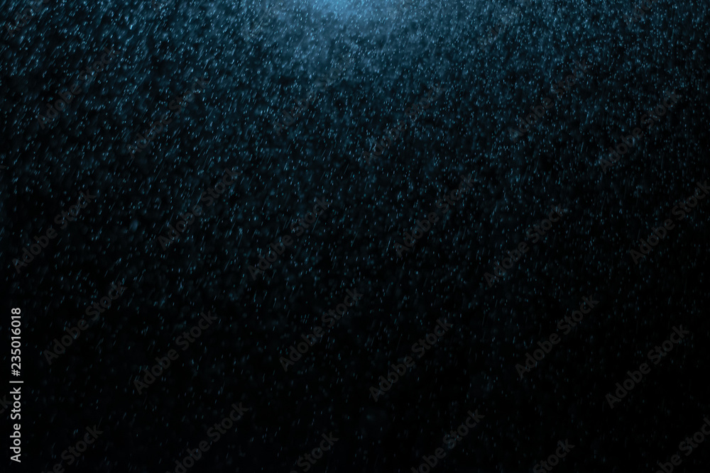 Water jet spraying on black background Stock Photo | Adobe Stock