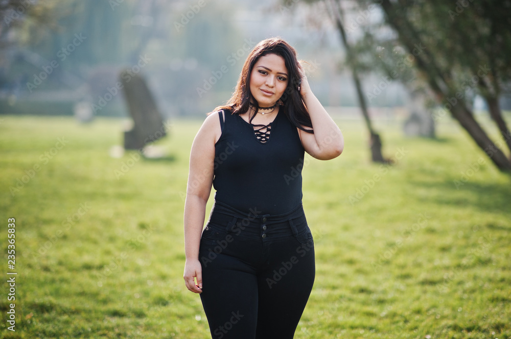 Pretty latino model girl from Ecuador wear on black posed at street ...