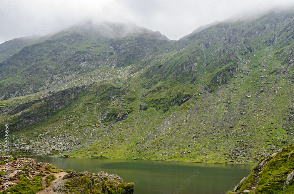 The glacier lake called Balea (Balea Lac) on the Transfagarasan road ...