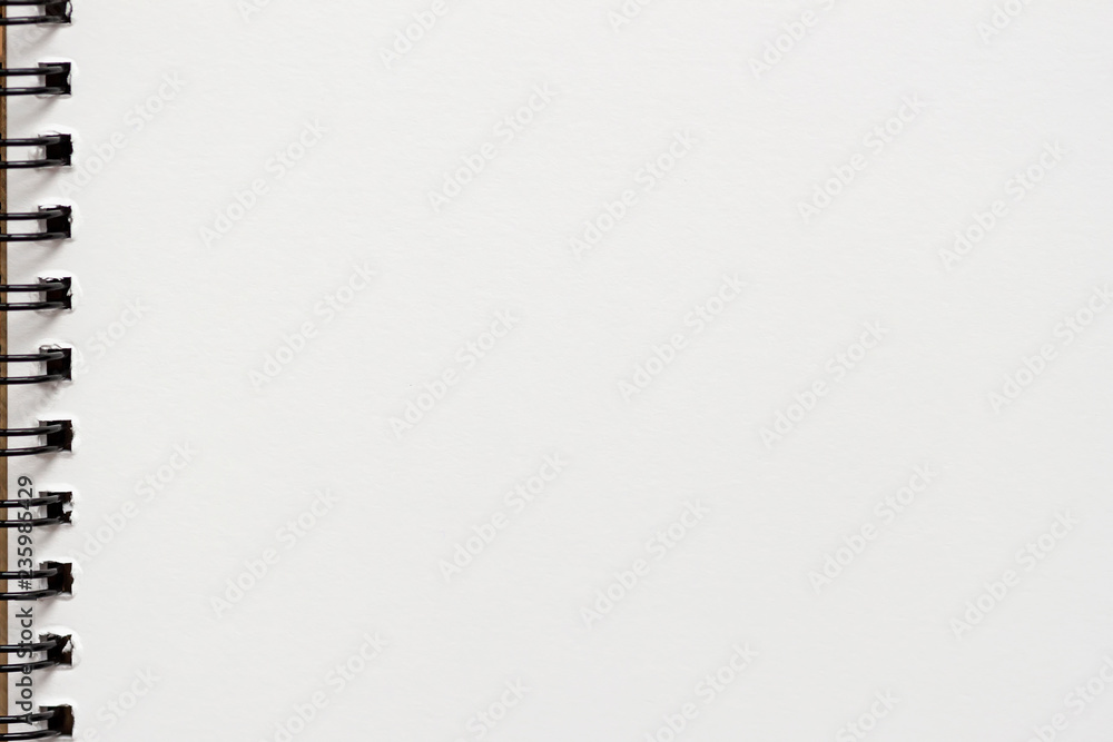 Texture of paper for artwork, sketchbook, on spiral for sketches. With ...
