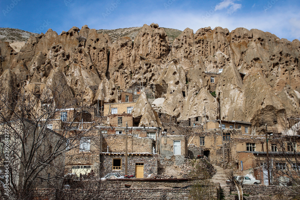 Ancient Iranian cave village in the rocks of Kandovan. The legacy of ...