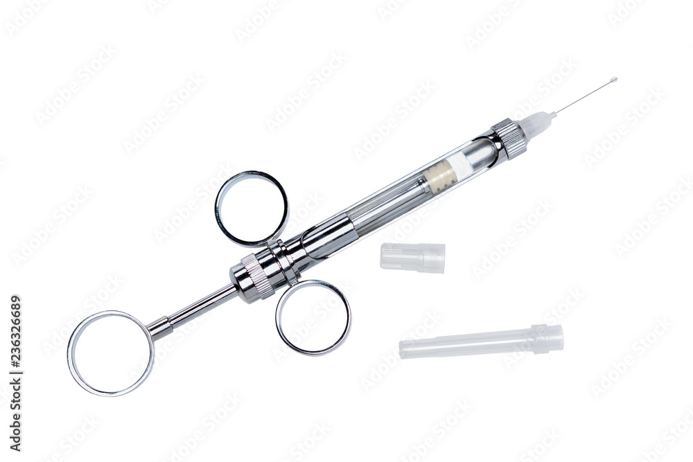 Syringe for anesthesia in dentistry with a used capsule for the needle ...