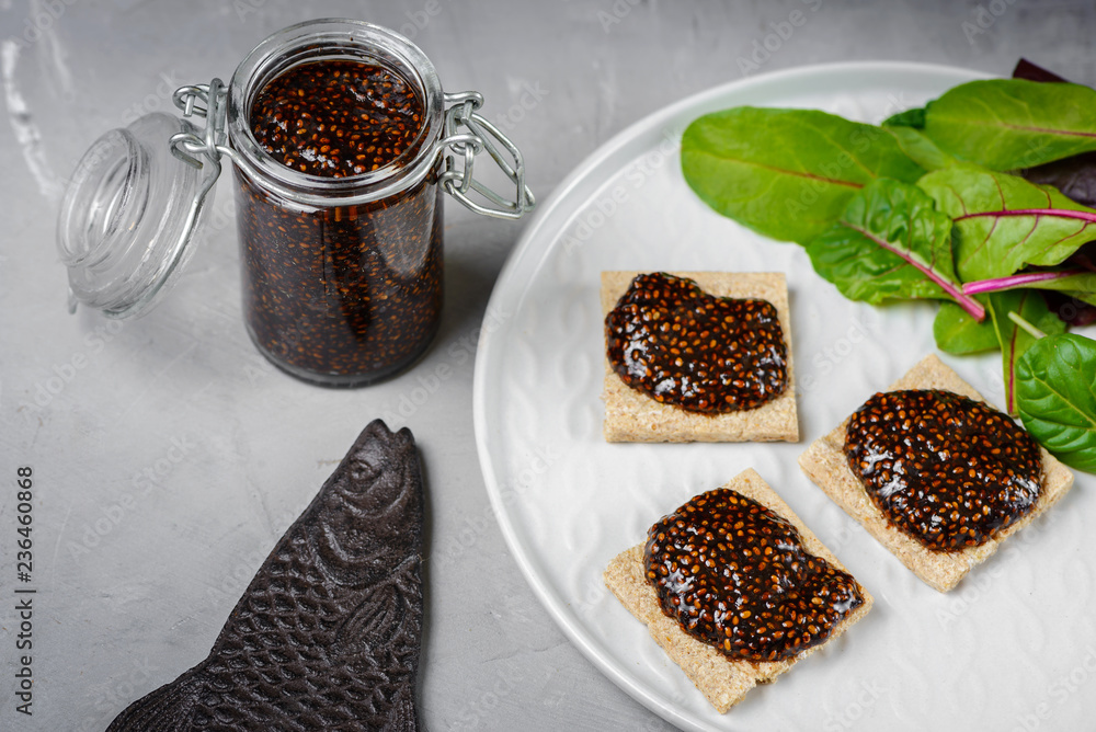 Vegan caviar made with chia seeds and nori. Appetizers on whole grain ...