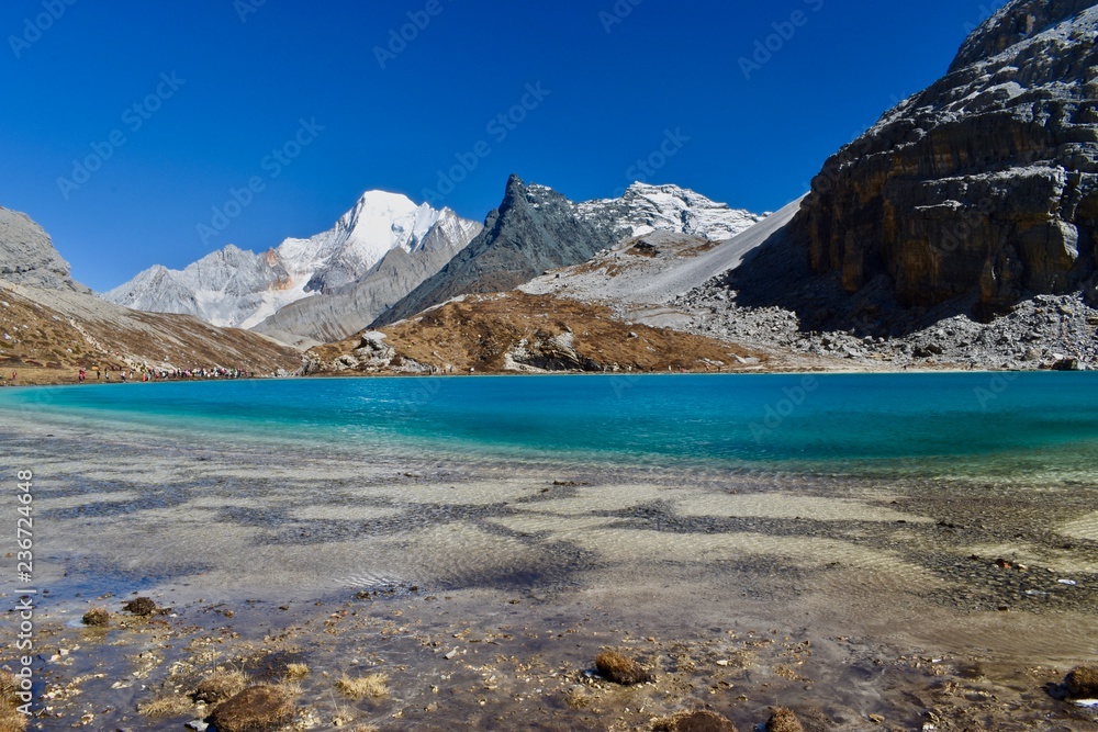 Unique colored Milk lake (approx. 4300m altitude) with blue sky and ...