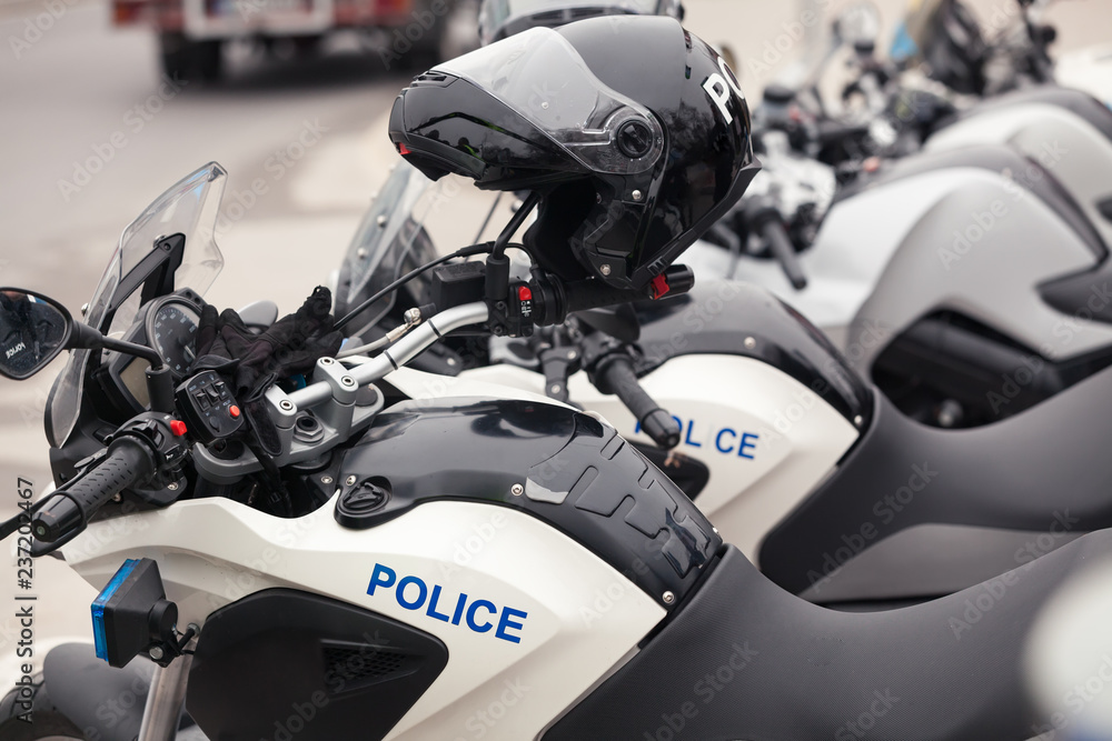 Row of new police motorbikes on the street Stock Photo | Adobe Stock