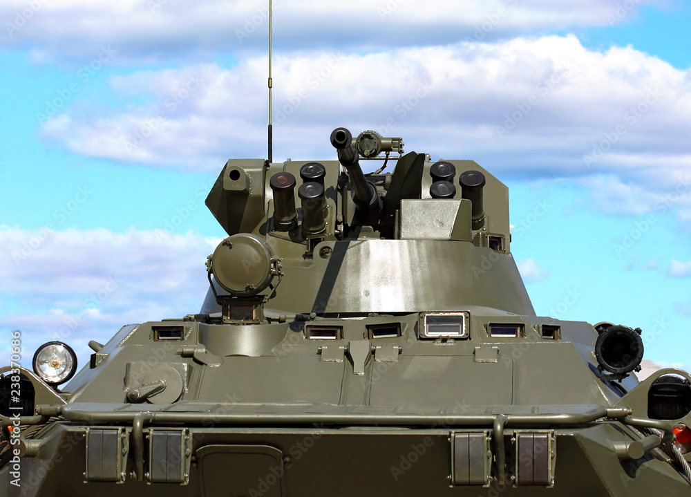 Automatic cannon and machine gun on the turret Stock Photo | Adobe Stock