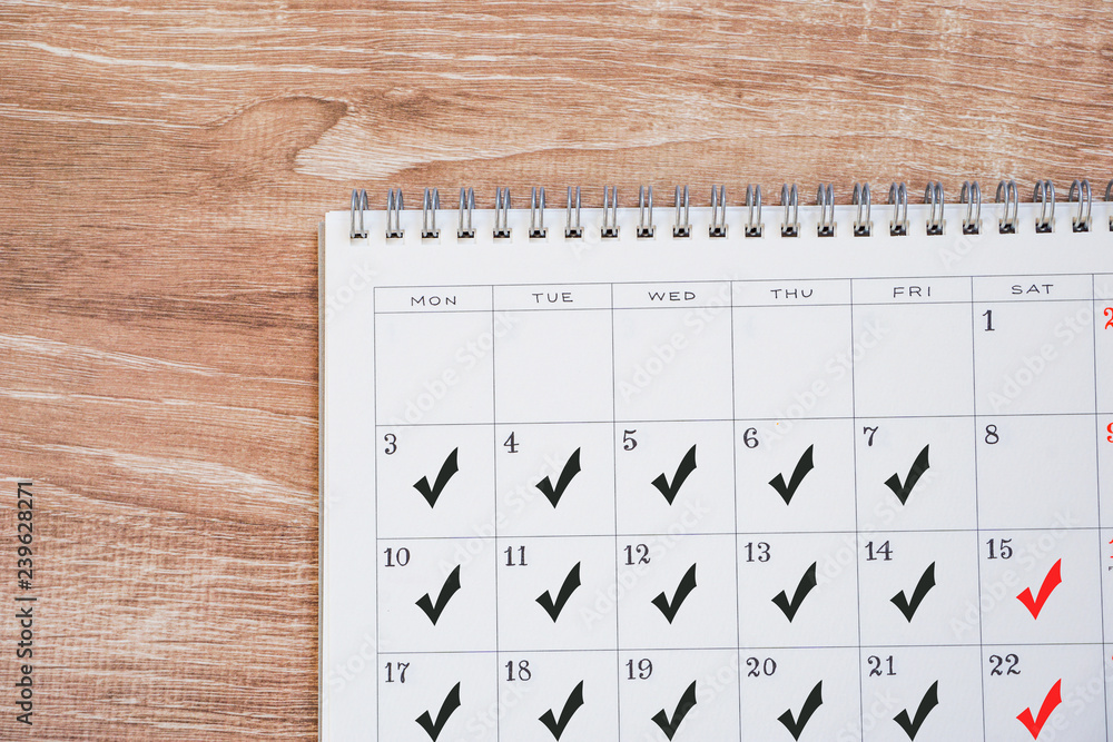 Calendar and check. Employee days or schedule filled. カレンダーとチェック Stock ...