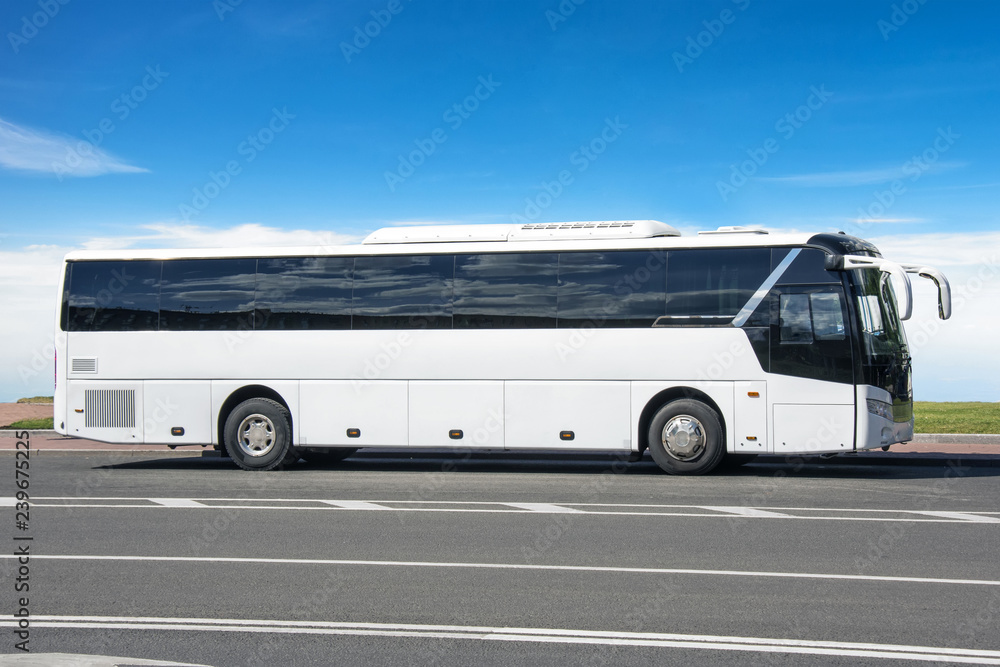 Comfortable white tourist bus on the highway in travel. Stock Photo ...