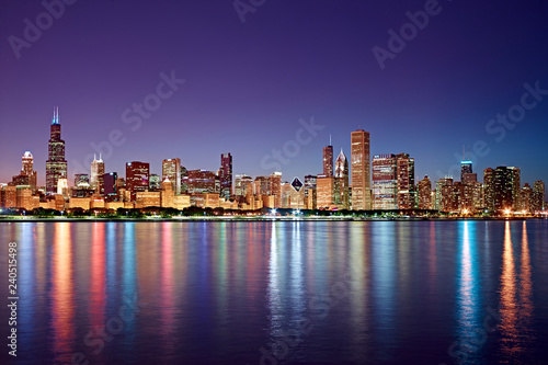 Chicago Skyline at Night with skyscraper reflections in Lake Michigan ...