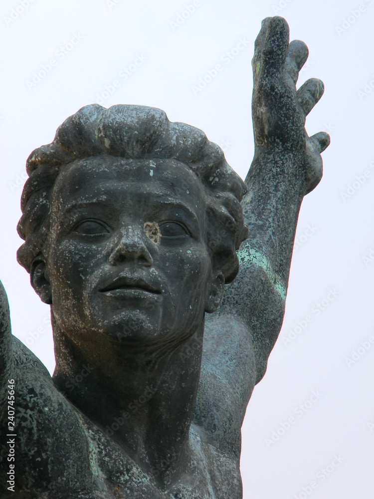 Close up shot of the head of the Torch Bearer sculpture at the Liberty ...
