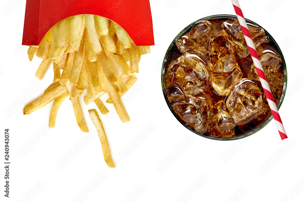 Cola or coke glass and scattered French fries in red box from top view ...