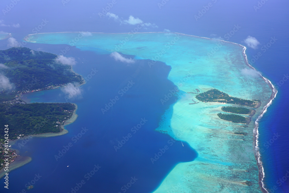 Aerial view of the Taha'a Island Resort and lagoon on Motu Tauta near ...