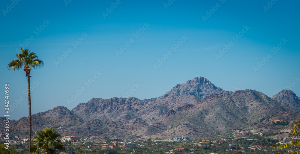 Neighborhoods at the base of tall mountains are rapidly growing in the ...
