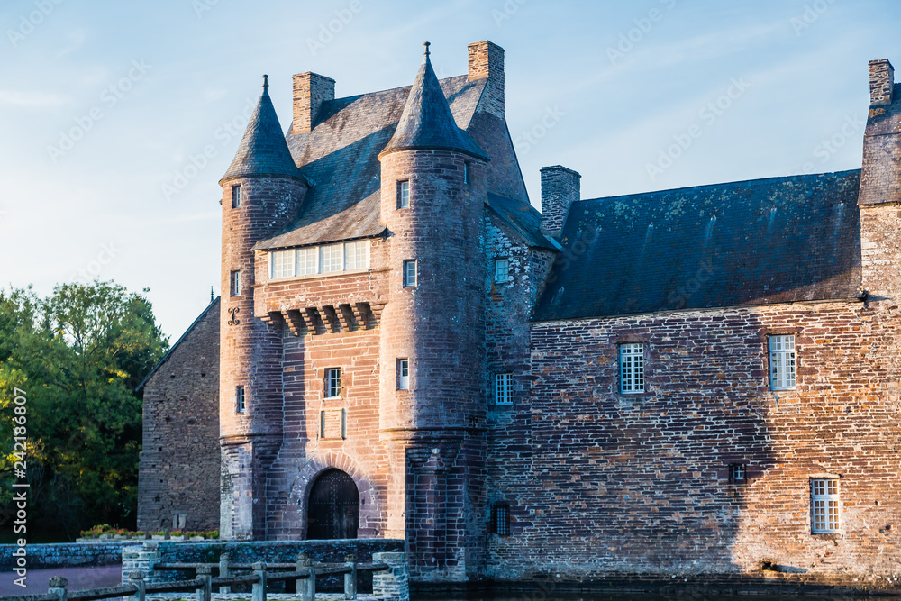 The turrets and drawbridge of the 14th century Chateau de Trecesson in ...