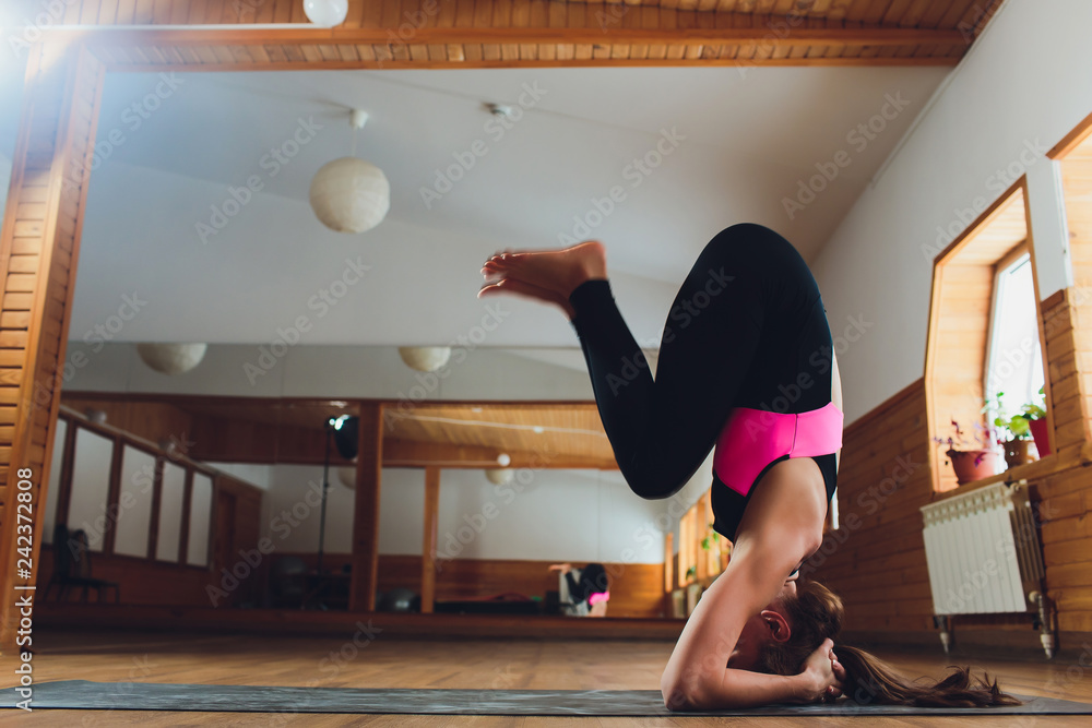 Young yogi attractive woman practicing yoga concept, standing in ...