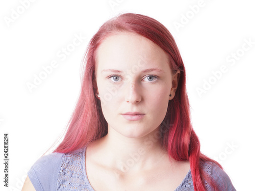 young woman with a neutral expression on her face Stock Photo | Adobe Stock