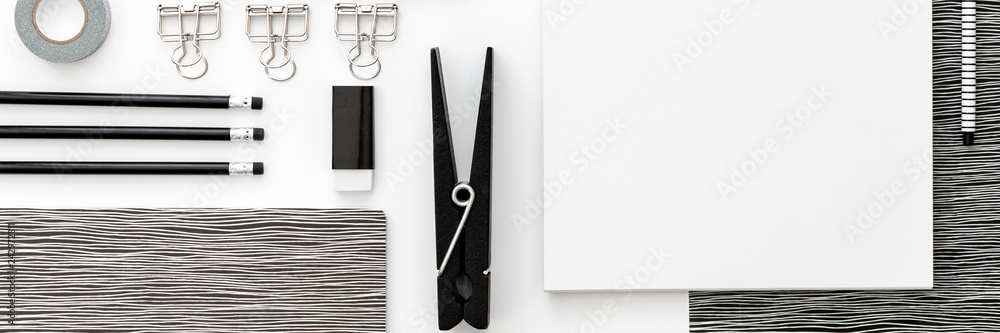 Flat lay white skretch book mockup with black office supplies on white ...