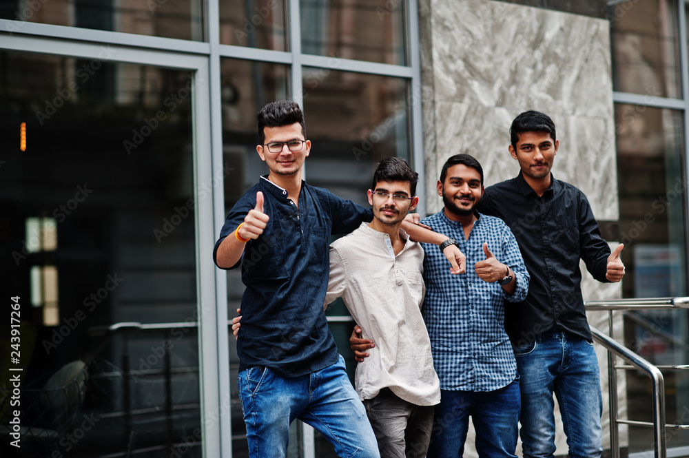 Photo Stock Group of four indian mans, wear on casual clothes, posed ...