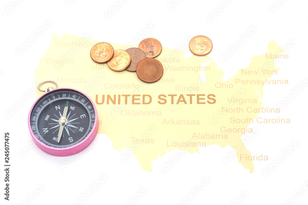 compass and coins on a American map. business travel concept Stock ...