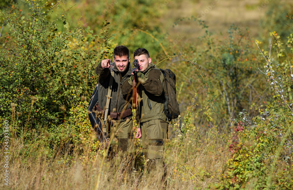 Friendship of men hunters. Man hunters with rifle gun. Boot camp ...