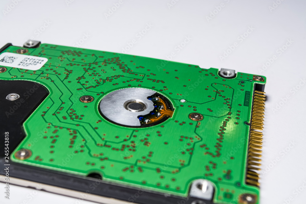 Winchester of green color. Hard drive. Motherboard. Computer spare ...