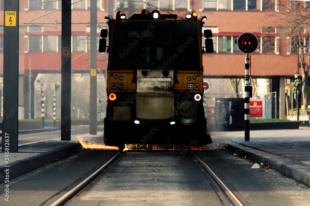 Contruction work on a tram line looks like the tram is derailing with a ...