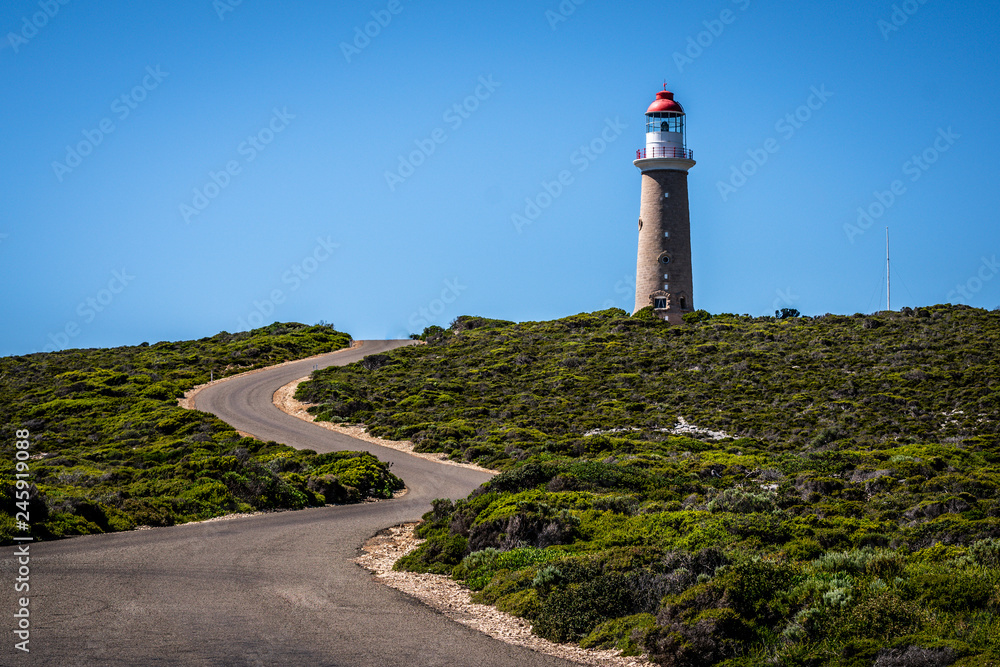 Lighthouse with red top and winding road at Cape du Couedic on Kangaroo ...