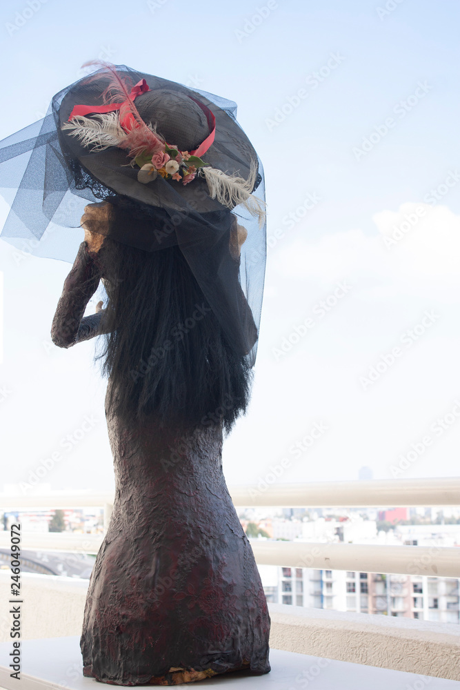 3D catrina sculpture in posture showing back in Mexico City placing ...
