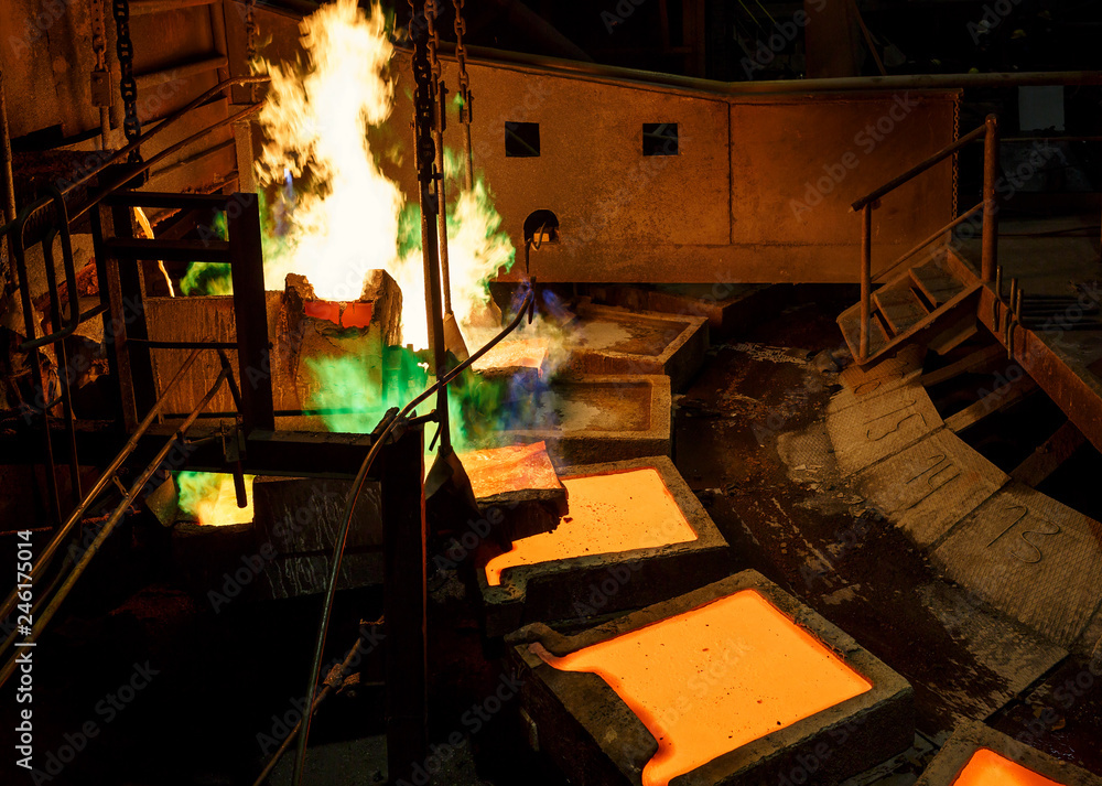 Copper production at the metallurgical plant. The molten metal is ...