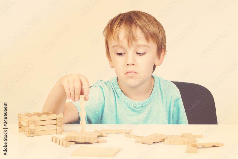 Tired schoolboy over white background. Sad or bored boy with hard ...